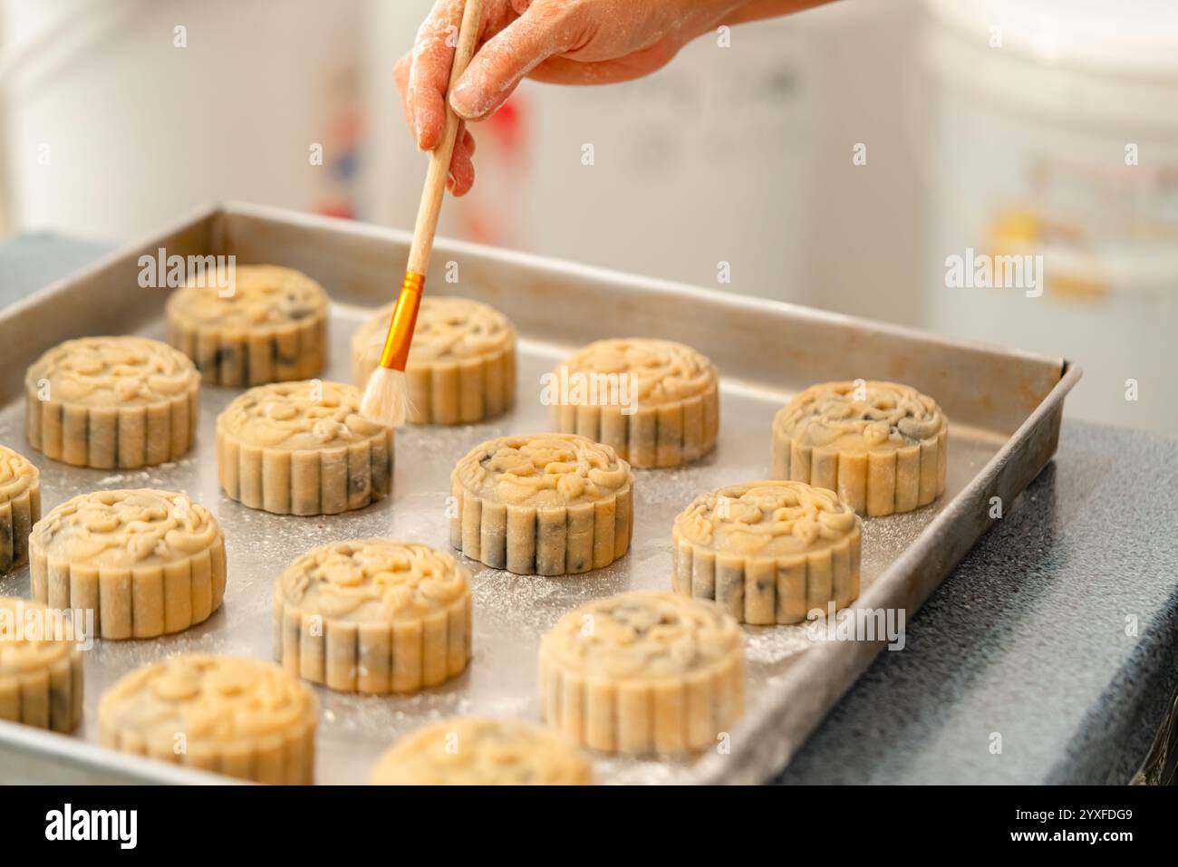 Mooncake making process. A mooncake is a Chinese bakery product ...