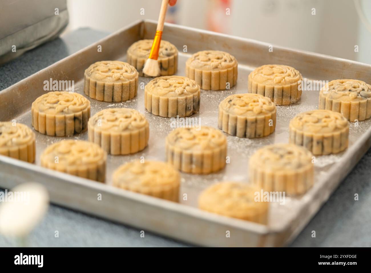 Mooncake making process. A mooncake is a Chinese bakery product ...