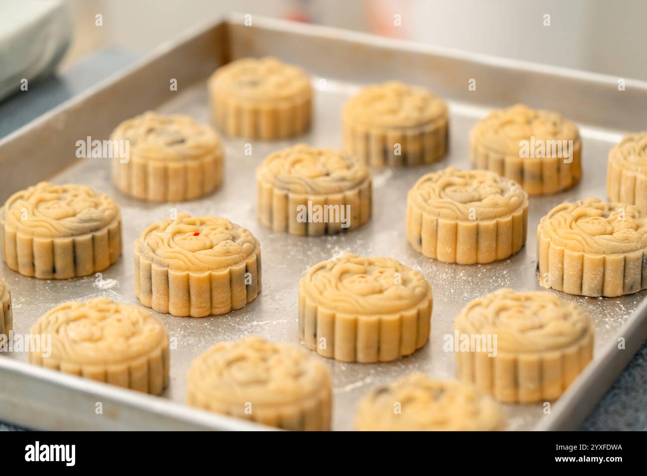 Mooncake making process. A mooncake is a Chinese bakery product ...