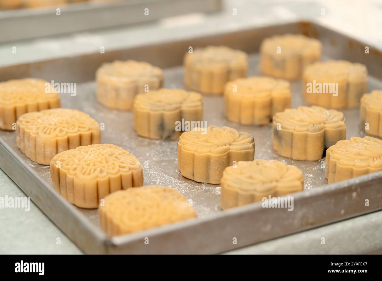 Mooncake making process. A mooncake is a Chinese bakery product ...