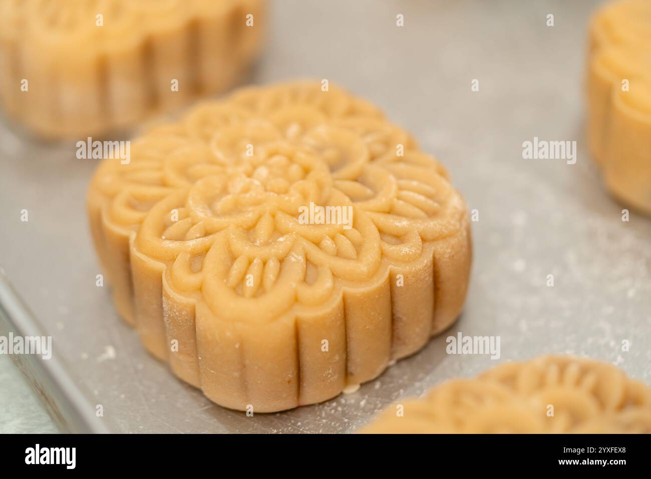 Mooncake making process. A mooncake is a Chinese bakery product ...