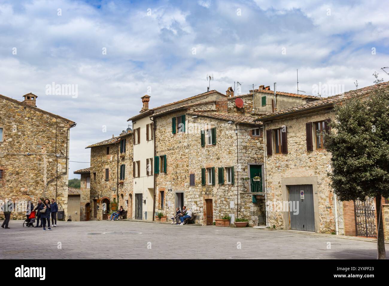 Historic houses at the central square in Castellina in Chianti, Italy ...