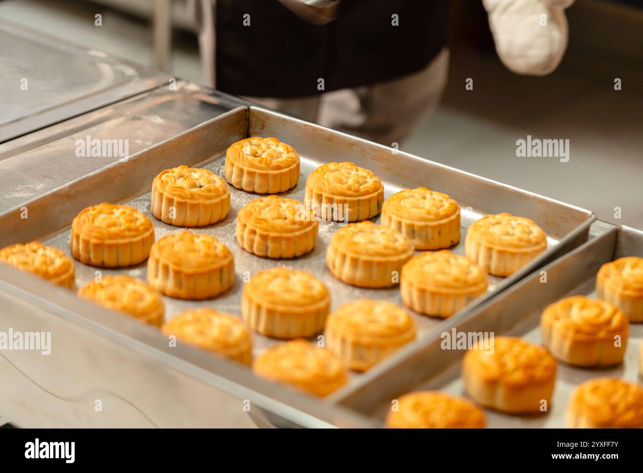 Mooncake making process. A mooncake is a Chinese bakery product ...