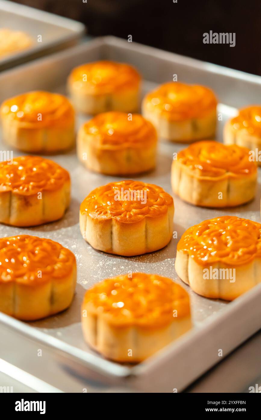 Mooncake making process. A mooncake is a Chinese bakery product ...