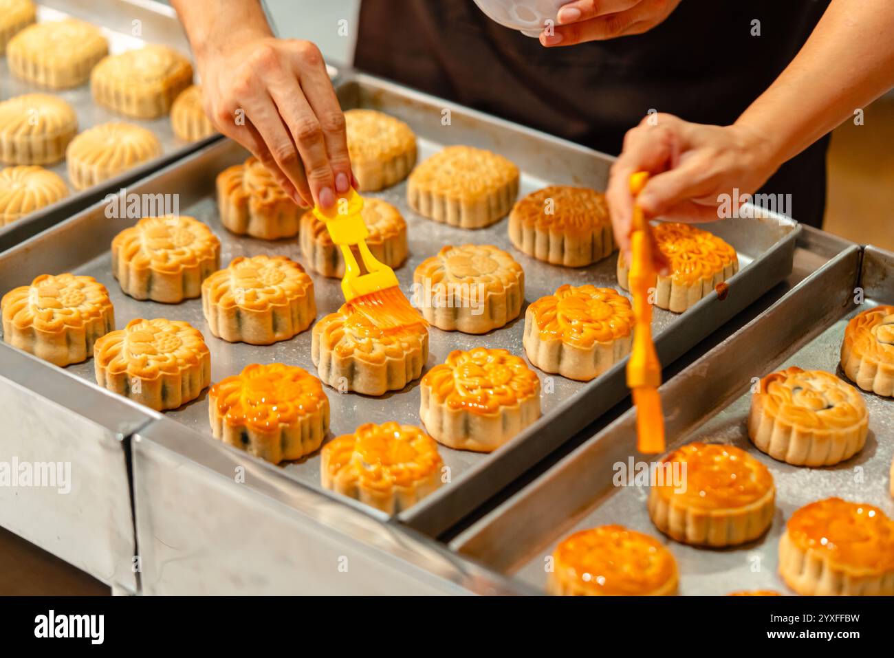 Mooncake making process. A mooncake is a Chinese bakery product ...