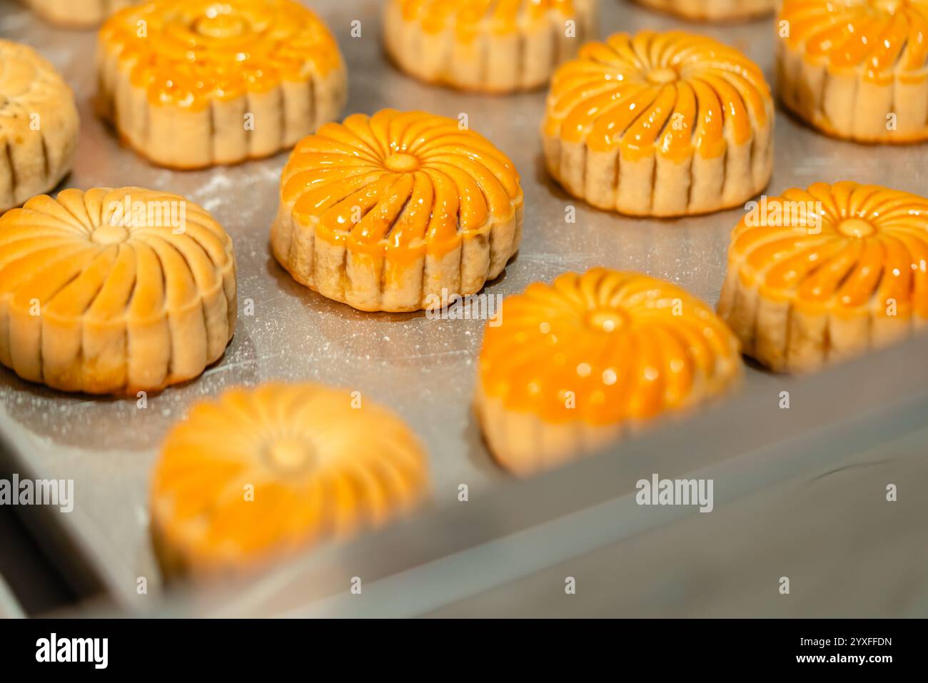 Mooncake making process. A mooncake is a Chinese bakery product ...