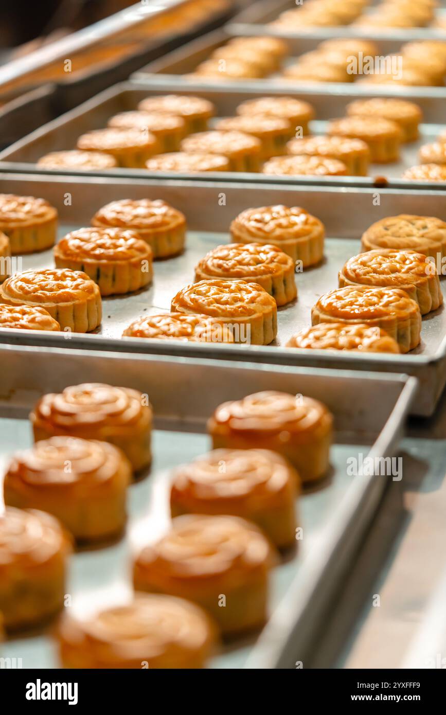 Mooncake making process. A mooncake is a Chinese bakery product ...