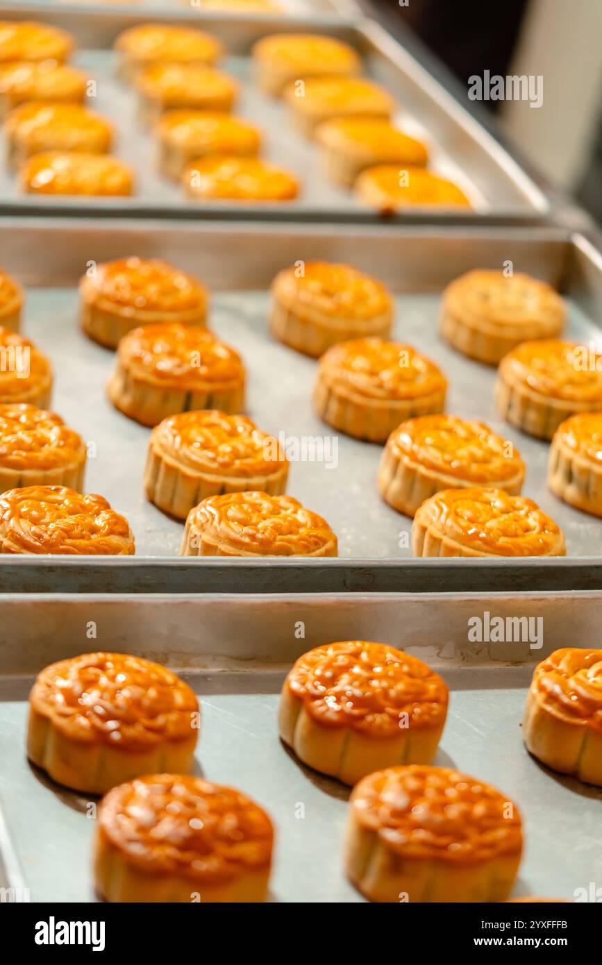 Mooncake making process. A mooncake is a Chinese bakery product ...