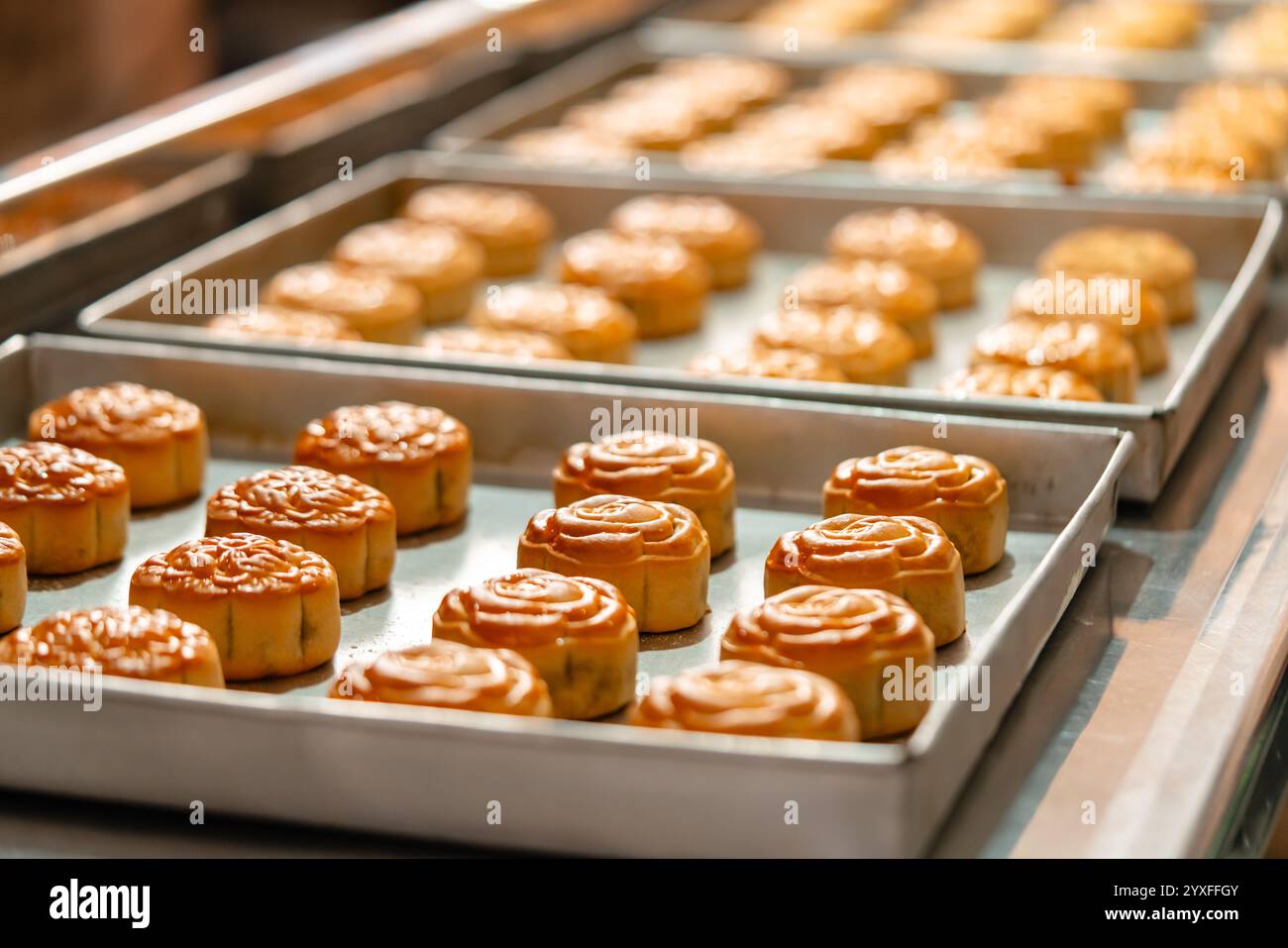 Mooncake making process. A mooncake is a Chinese bakery product ...