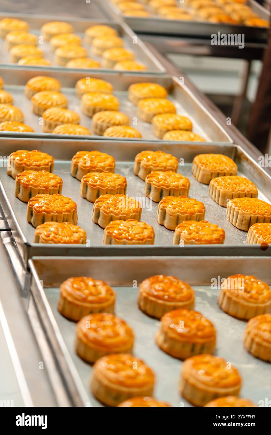 Mooncake making process. A mooncake is a Chinese bakery product ...