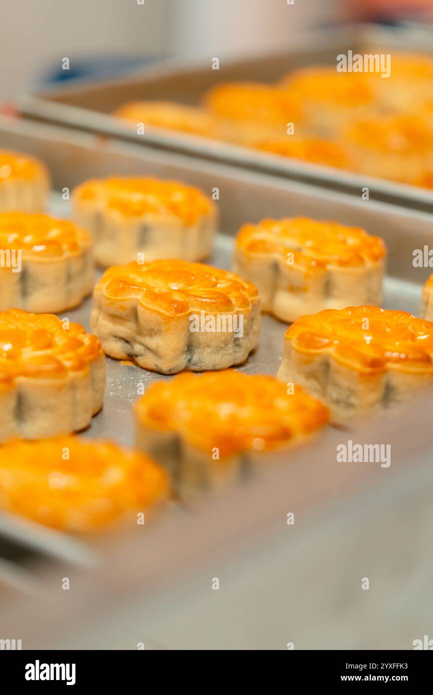 Mooncake making process. A mooncake is a Chinese bakery product ...