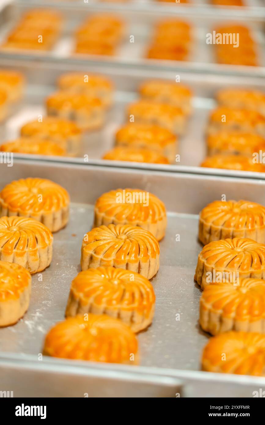 Mooncake making process. A mooncake is a Chinese bakery product ...