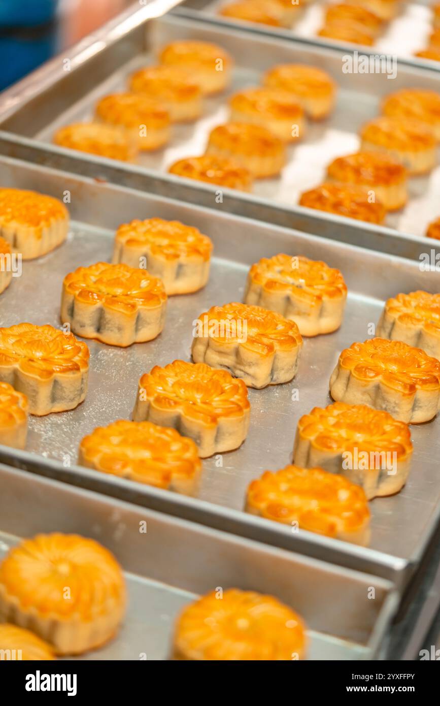 Mooncake making process. A mooncake is a Chinese bakery product ...