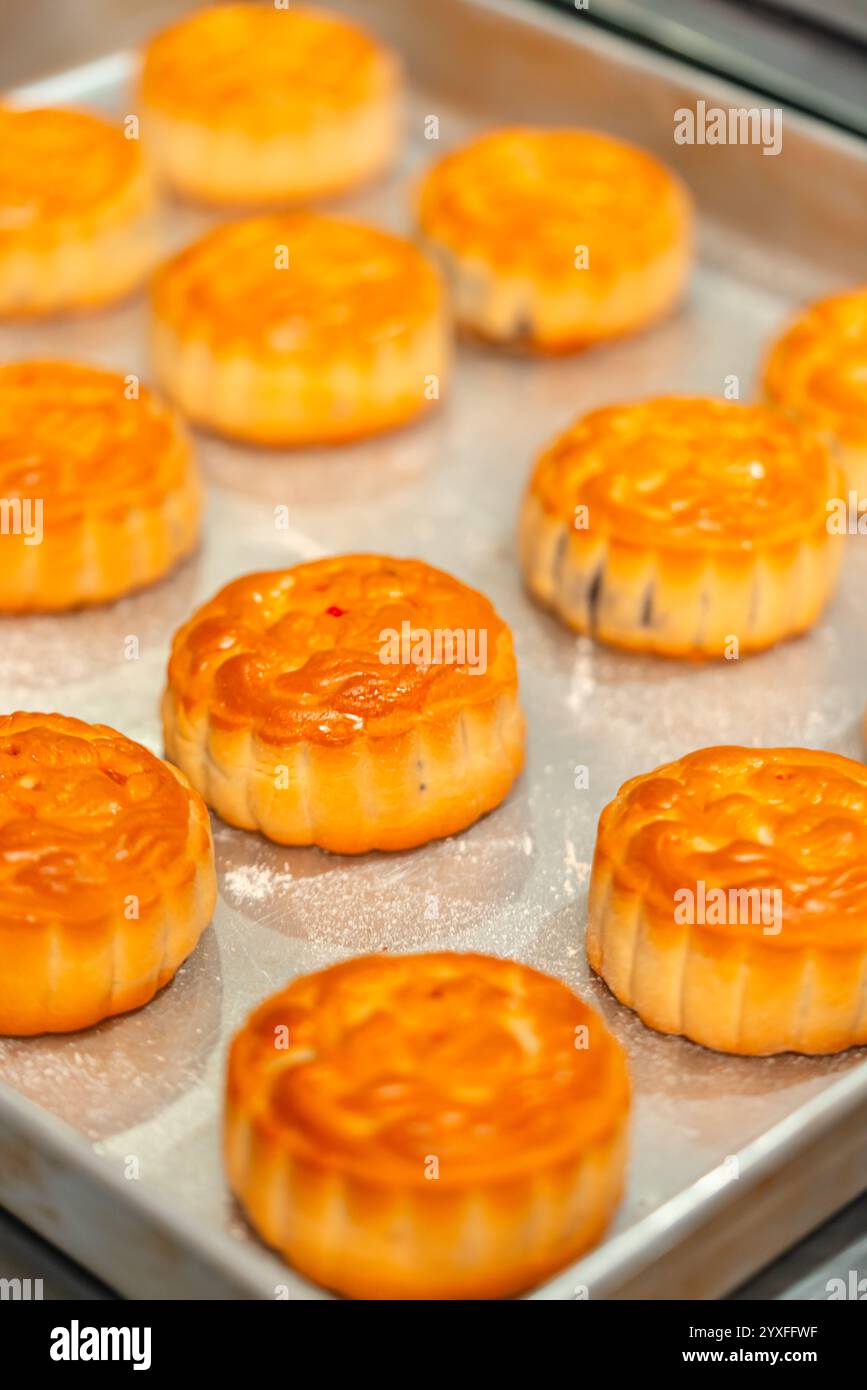 Mooncake making process. A mooncake is a Chinese bakery product ...
