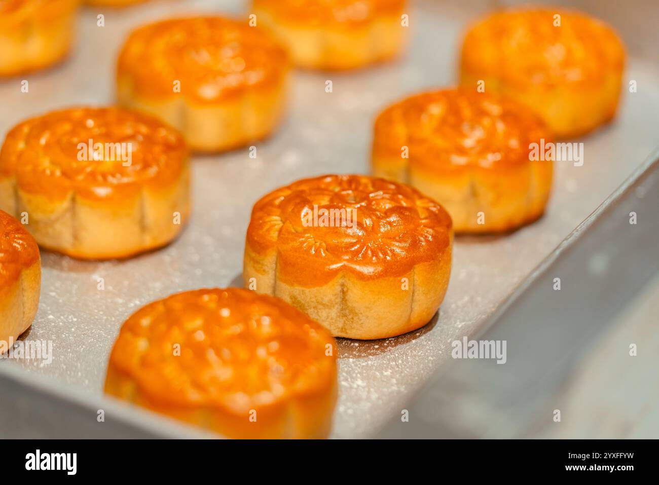 Mooncake making process. A mooncake is a Chinese bakery product ...