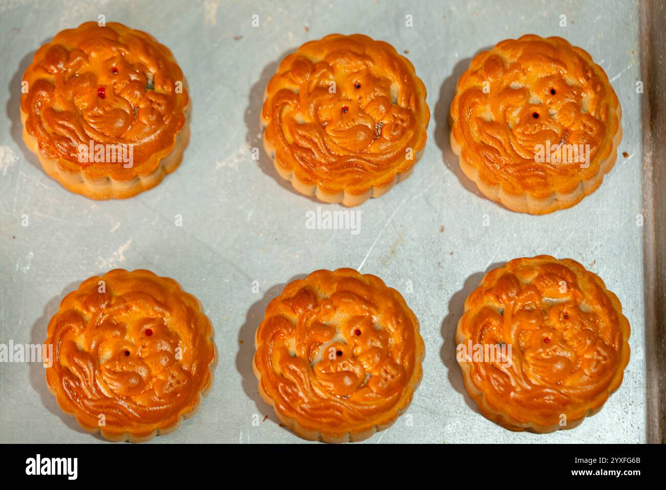 Mooncake making process. A mooncake is a Chinese bakery product ...