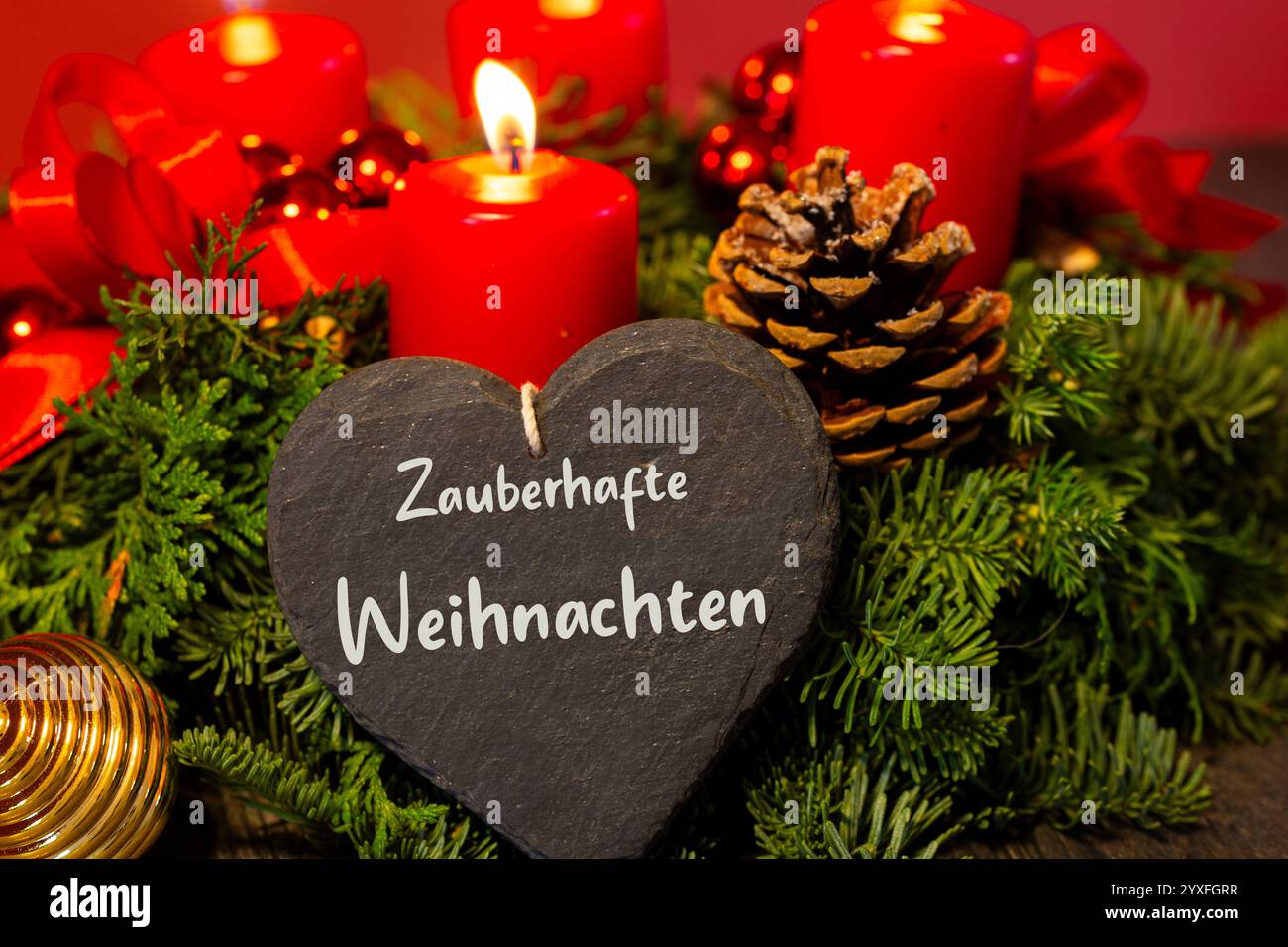 Heart with the inscription ZAUBERHAFTE WEIHNACHTEN in front of an ...