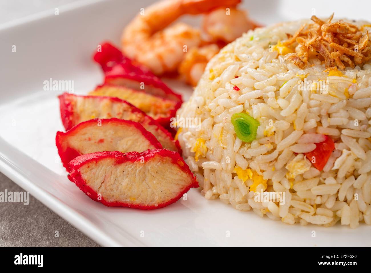 Yangzhou fried rice is a popular Chinese-style wok fried rice dish ...