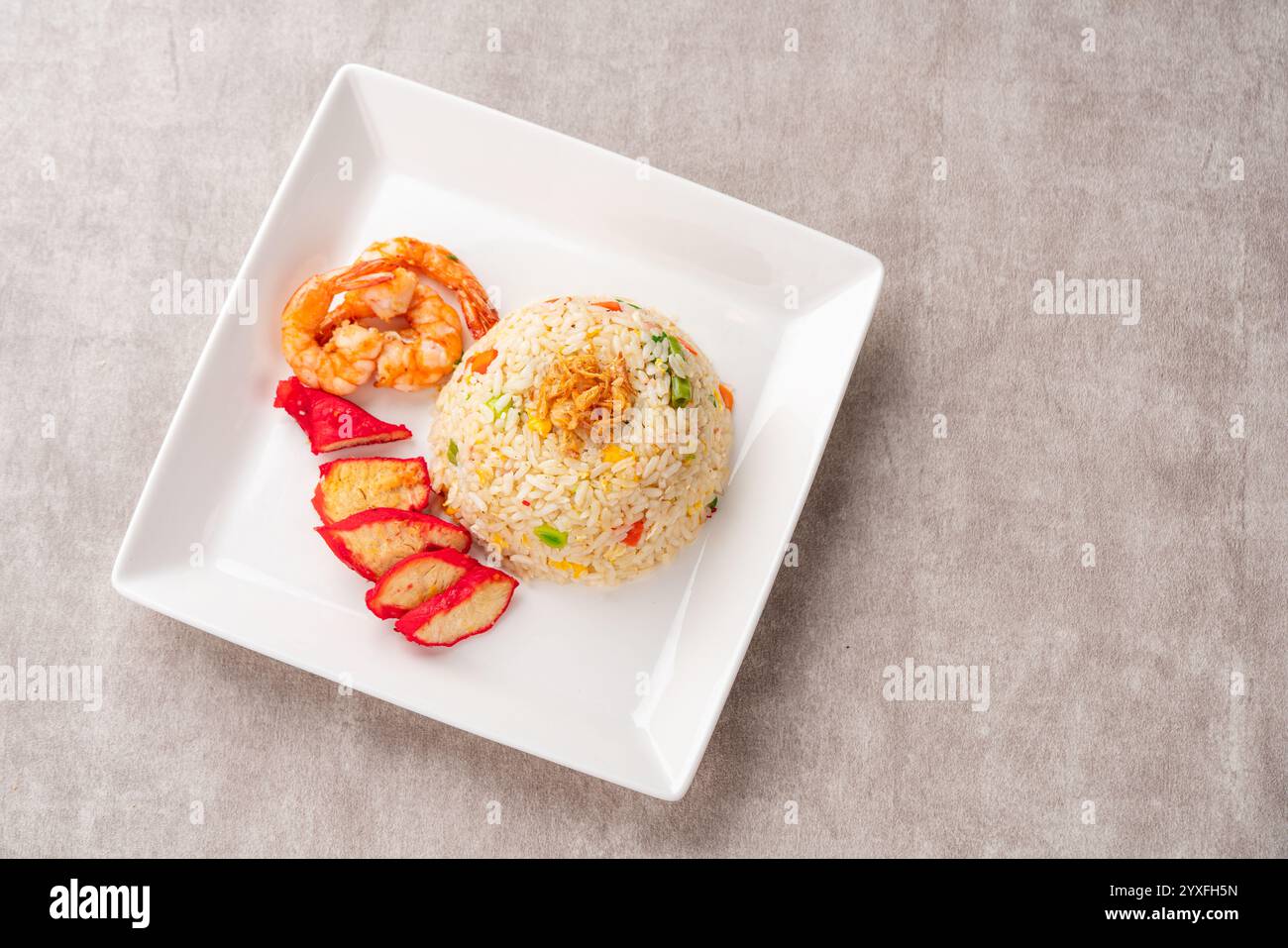 Yangzhou fried rice is a popular Chinese-style wok fried rice dish ...