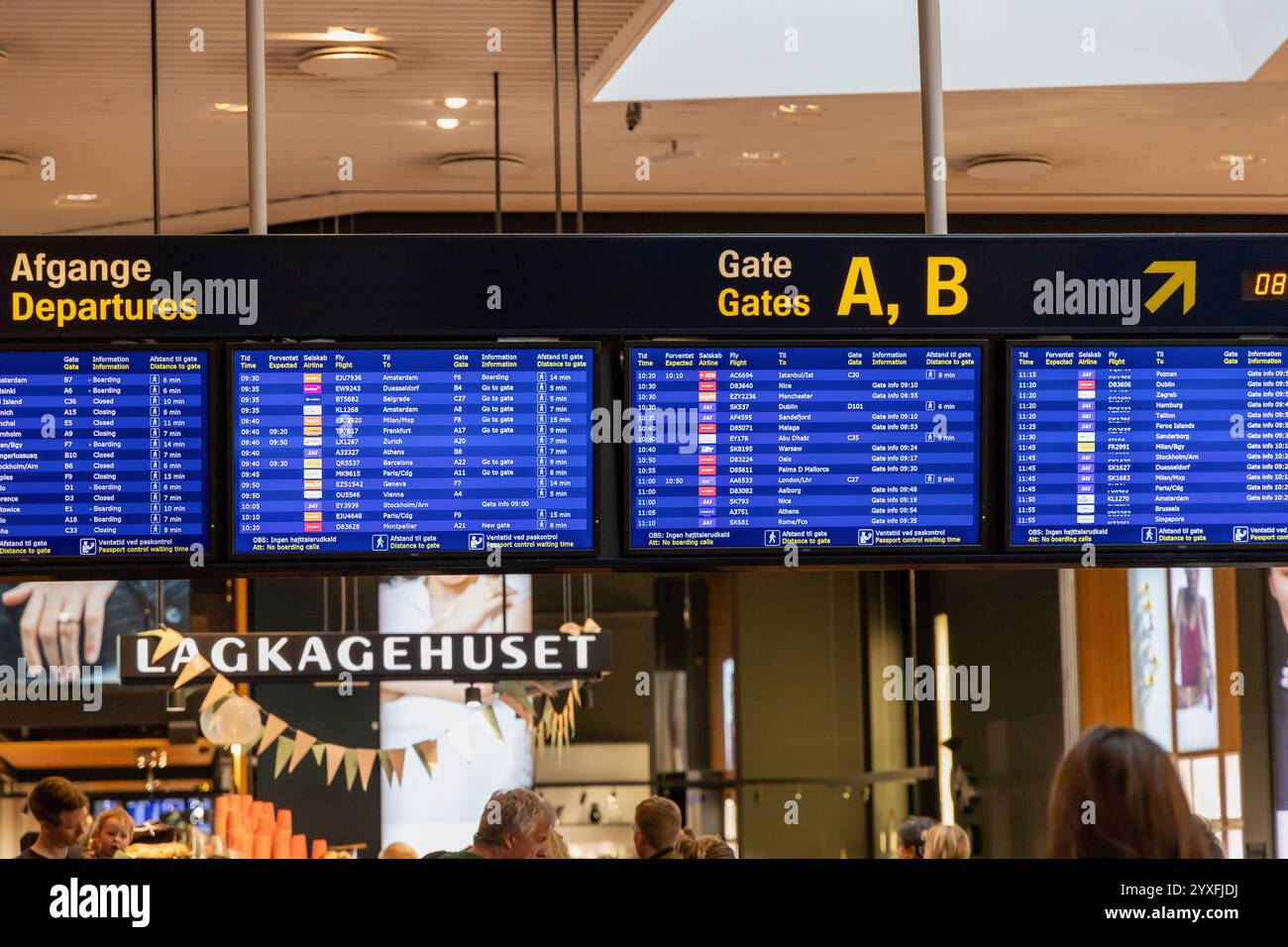 Copenhagen International Airport information board with flight ...