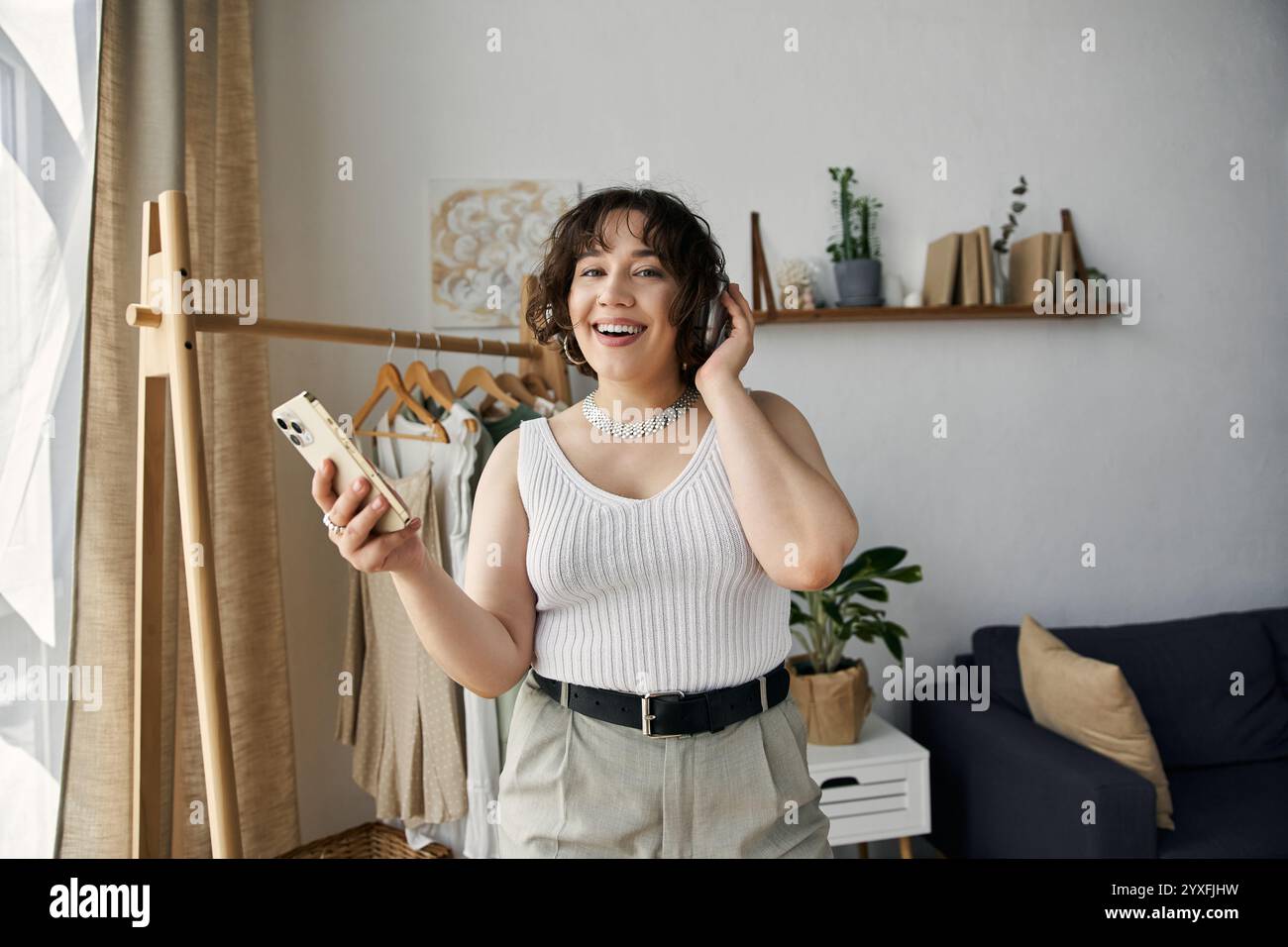Woman uses smartphone she hi-res stock photography and images - Alamy