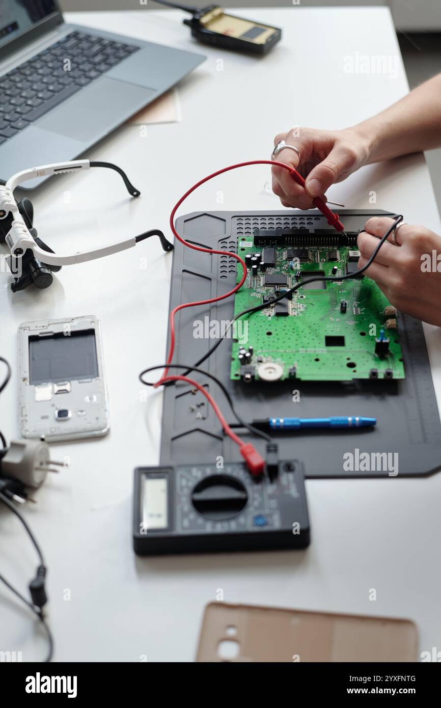 Testing Circuit Board in Laboratory Setting Stock Photo - Alamy