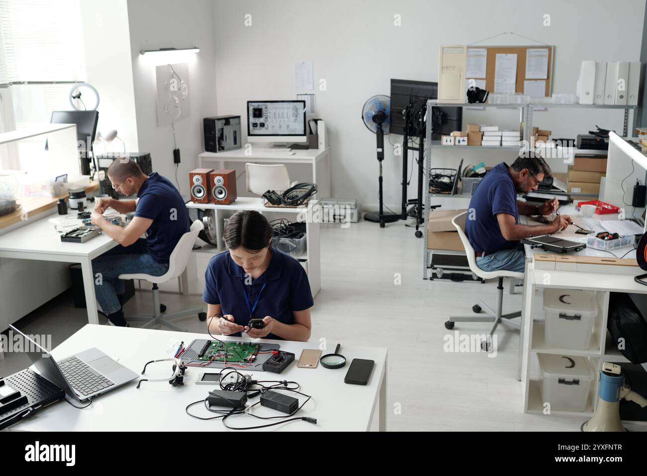 Electronics engineers working in lab hi-res stock photography and ...