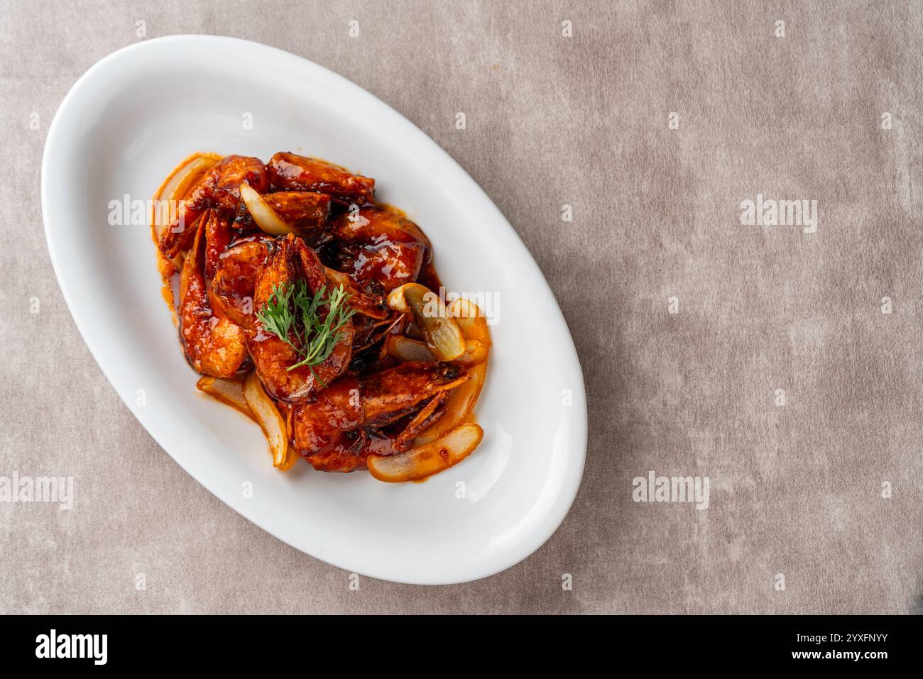 shrimp with butter sauce (Indonesia : udang saus mentega Stock Photo ...