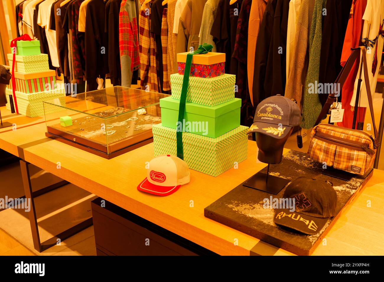 Colorful display of hats and gift boxes in a retail store showcasing ...