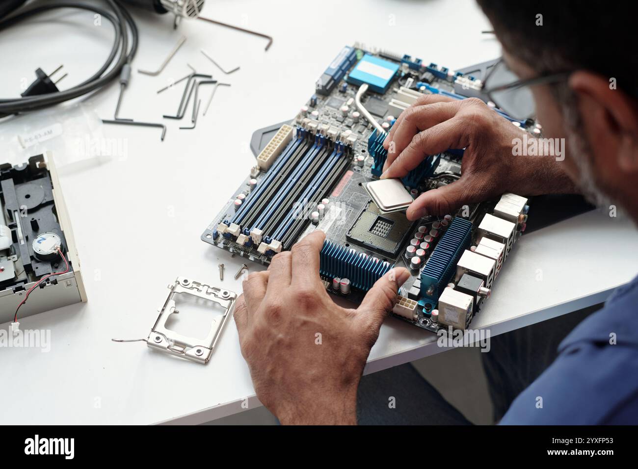 Assembling Computer Parts on White Table Stock Photo - Alamy