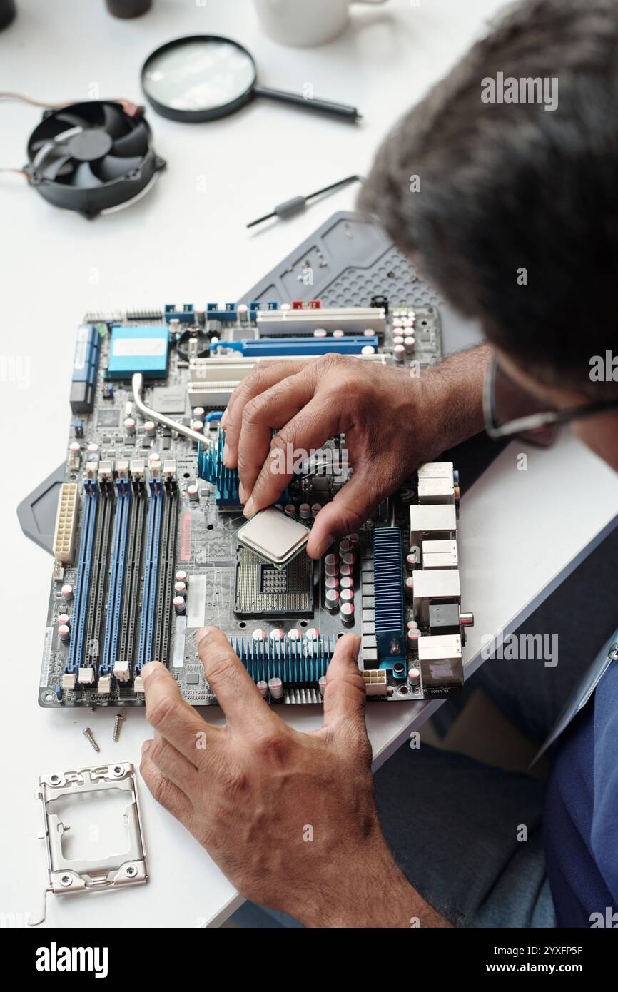 Assembling Computer Hardware Components on Workspace Stock Photo - Alamy