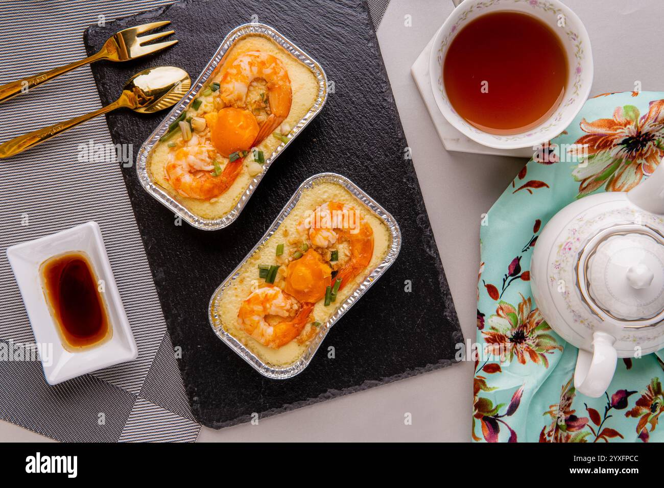 steam egg with salted egg and shrimp. Steam egg made by Eggs are beaten ...