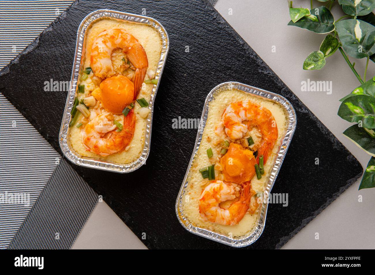 steam egg with salted egg and shrimp. Steam egg made by Eggs are beaten ...