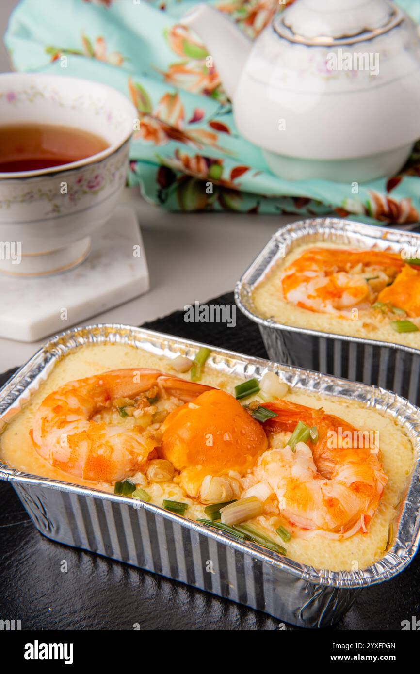 steam egg with salted egg and shrimp. Steam egg made by Eggs are beaten ...