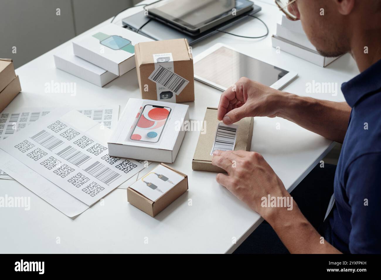 Packaging and Labeling Products in Organized Workspace Stock Photo - Alamy