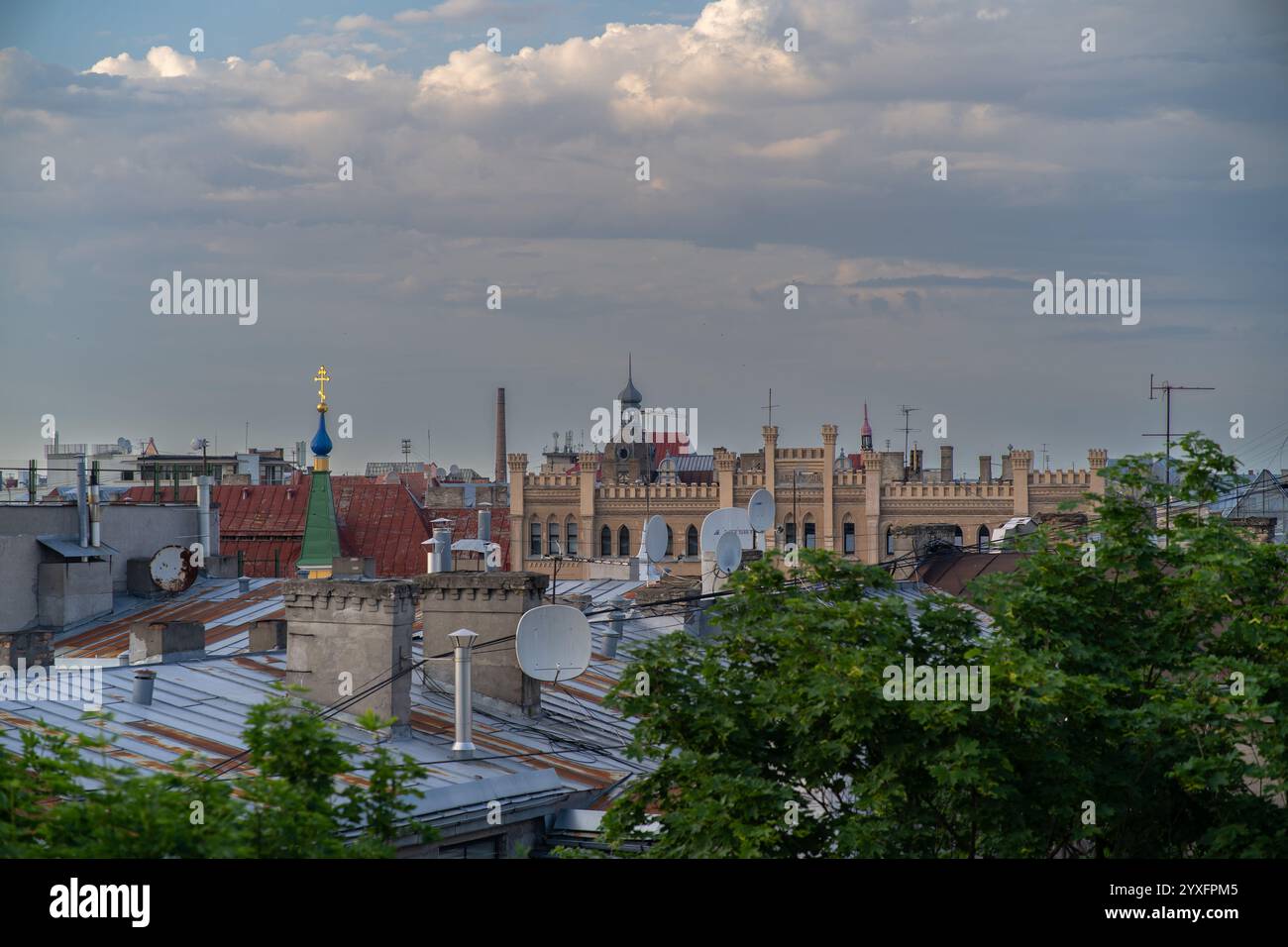 A scenic view of Riga's historic rooftops, featuring a prominent ...