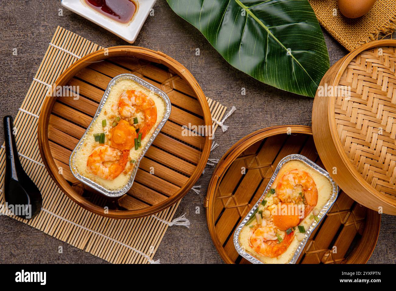 steam egg with salted egg and shrimp. Steam egg made by Eggs are beaten ...