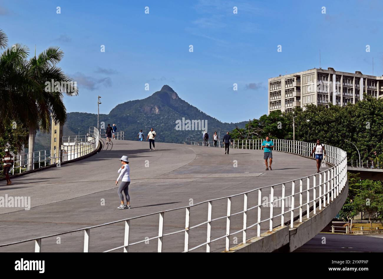 RIO DE JANEIRO, BRAZIL - December 13, 2024: People walking down a ...