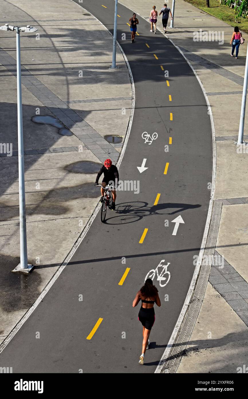 RIO DE JANEIRO, BRAZIL - December 13, 2024: People walking and running ...