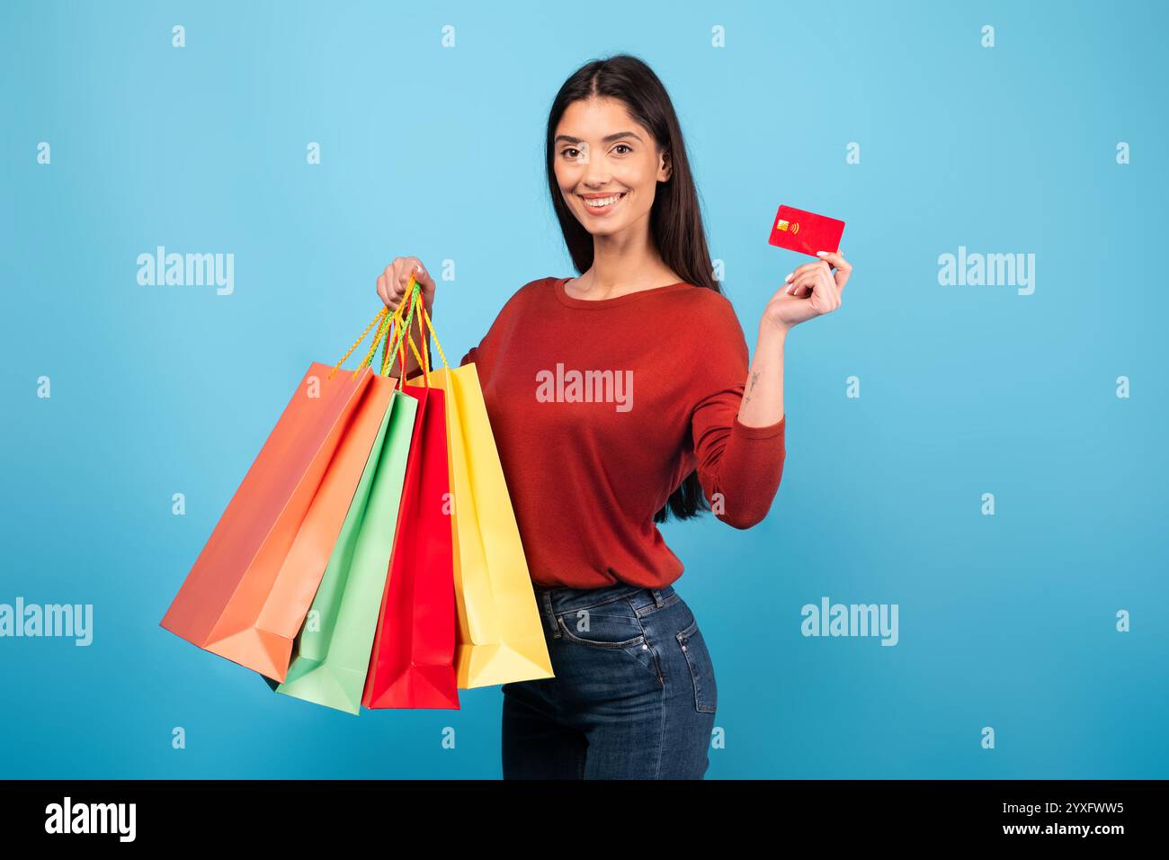 Young woman enjoying a day out shopping hi-res stock photography and ...