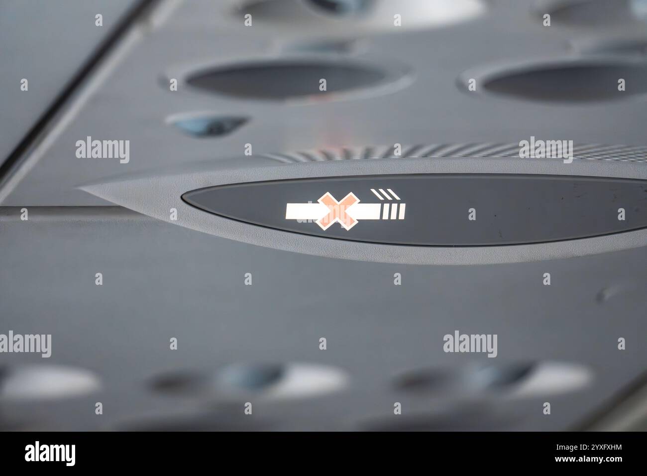 No smoking yellow plane sign while flying Stock Photo - Alamy