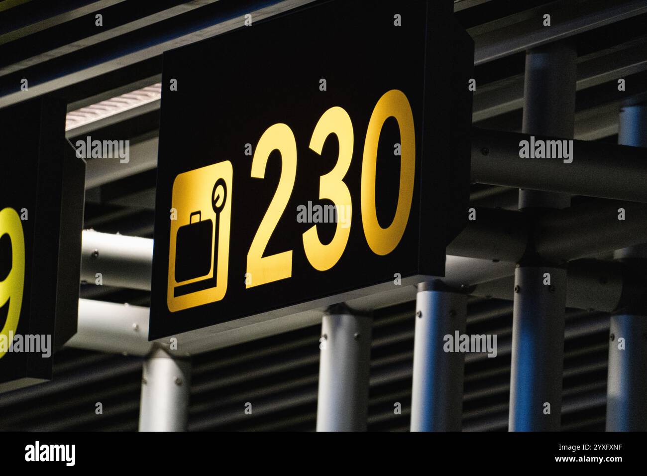Airport baggage claim sign backlit Stock Photo - Alamy
