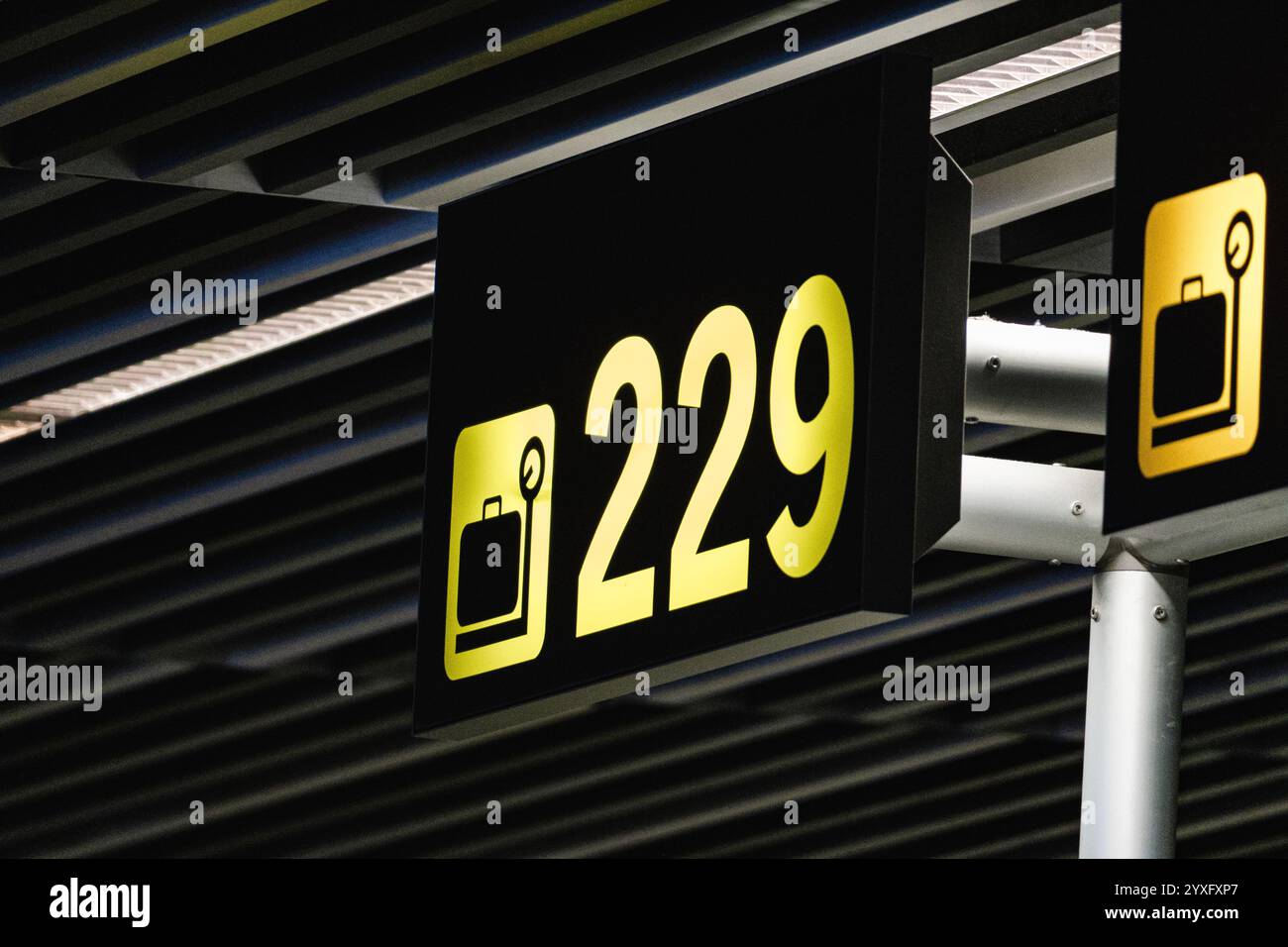 Airport baggage claim sign backlit Stock Photo - Alamy