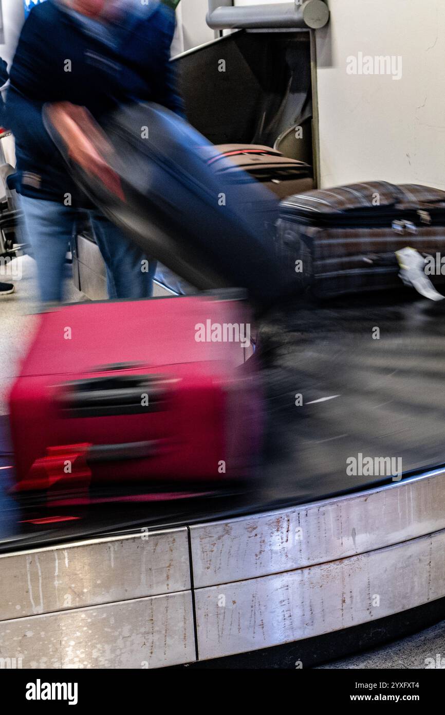 Baggage collection band at the airport Stock Photo - Alamy
