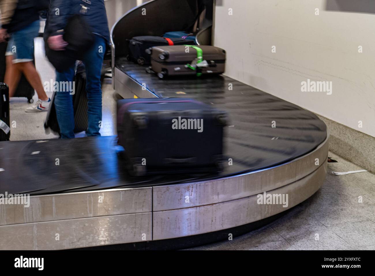 Baggage collection band at the airport Stock Photo - Alamy