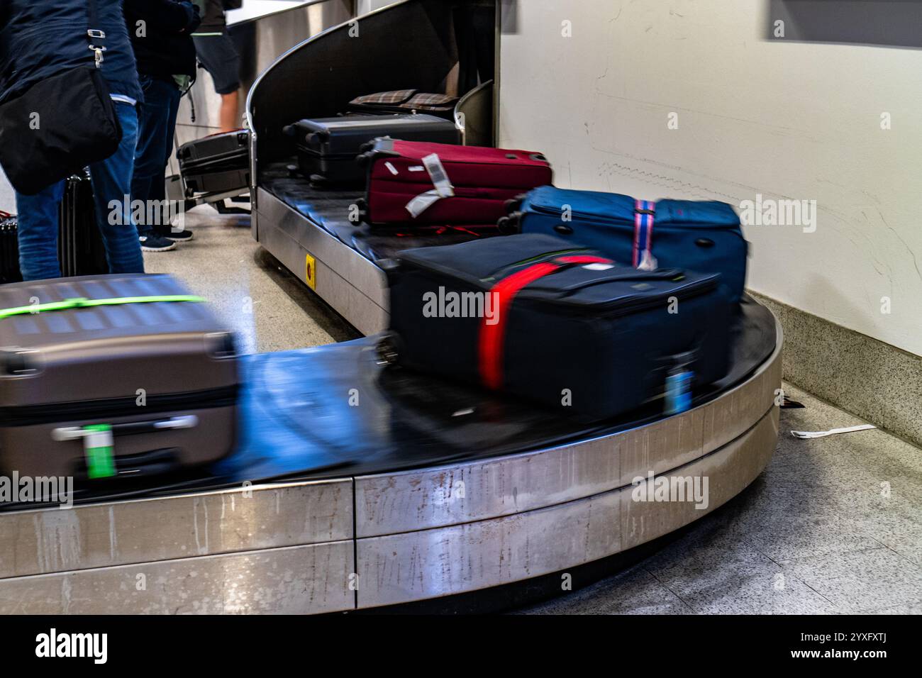 Baggage collection band at the airport Stock Photo - Alamy