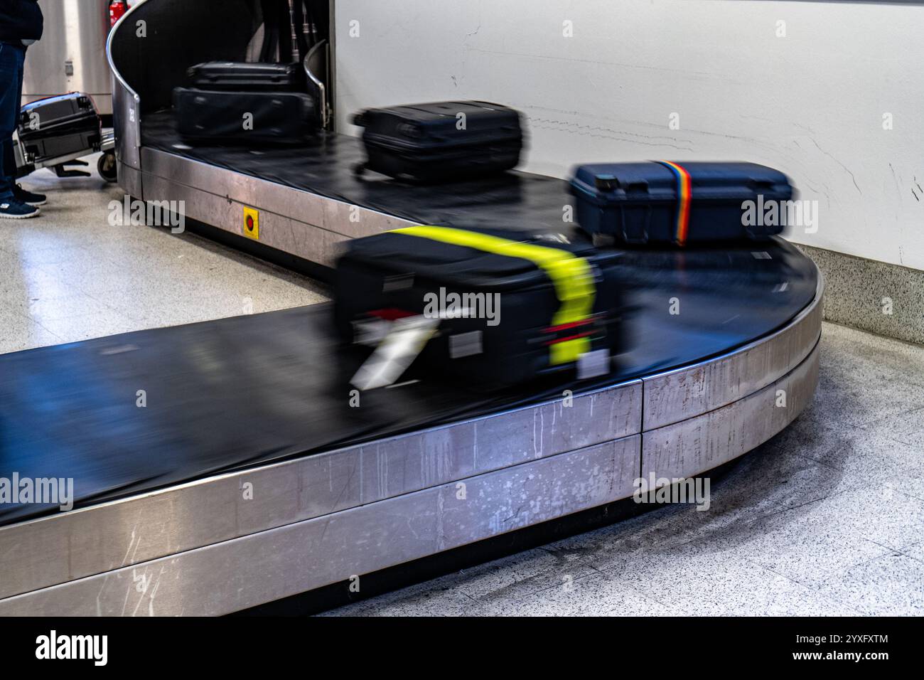 Baggage collection band at the airport Stock Photo - Alamy