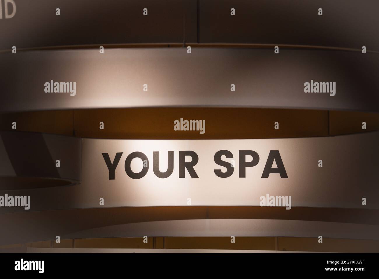 wellness sight "your spa" illuminated with white light Stock Photo - Alamy