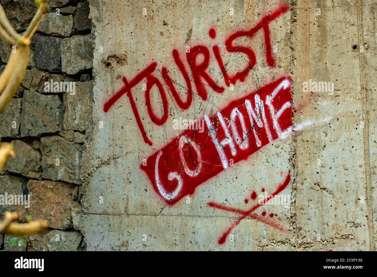 Tourist go home. Stop mass tourism concept Stock Photo - Alamy
