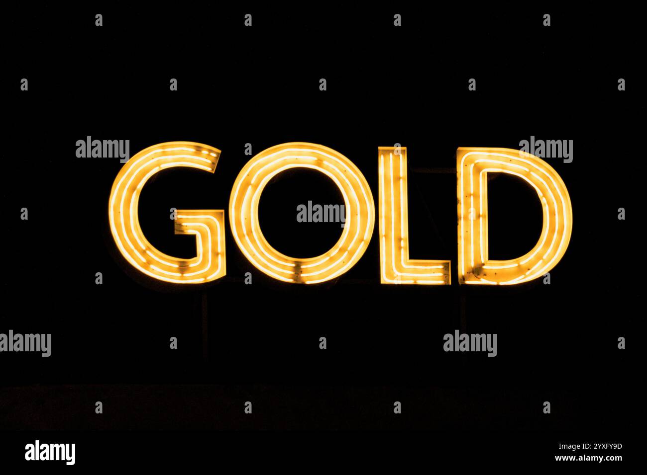 gold font and sign for promotion event Stock Photo - Alamy
